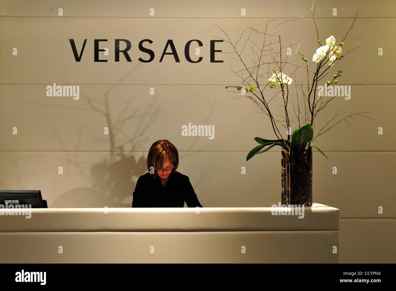 March 17, 2010 - A Versace employee preps their booth at Basel World ...