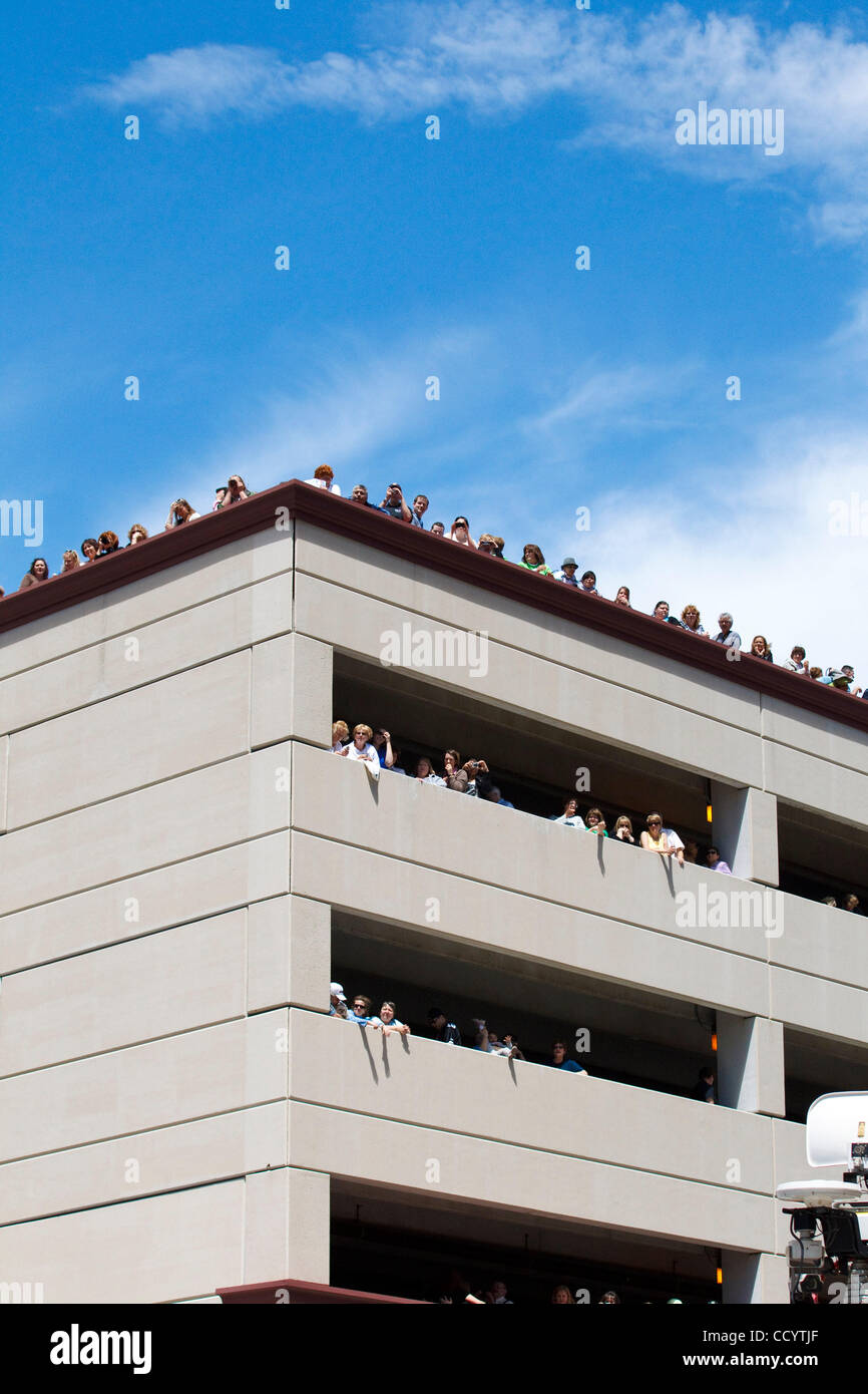 MAY 14, 2010: Fan line up on the rooftop of a parking garage to see ...