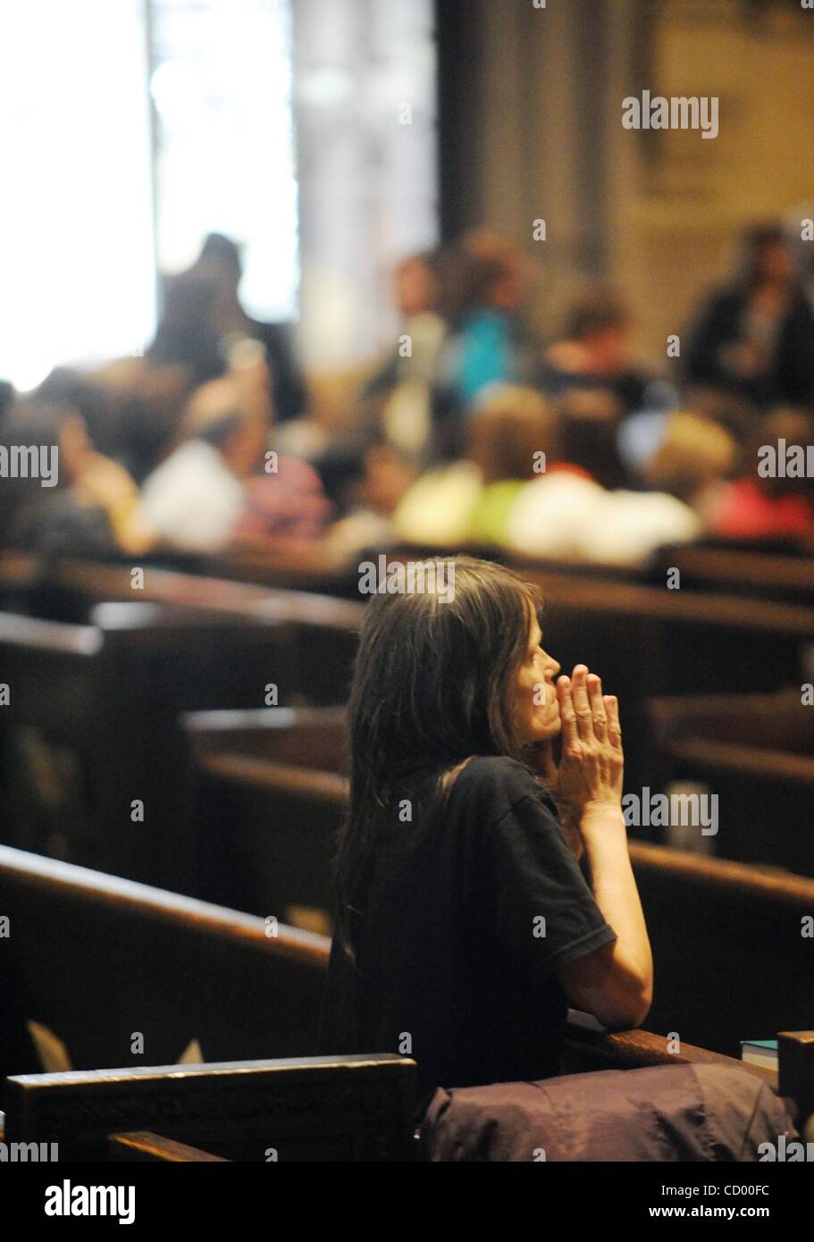 Apr 11, 2010 - Manhattan, New York, USA - A woman in prayer as Most ...