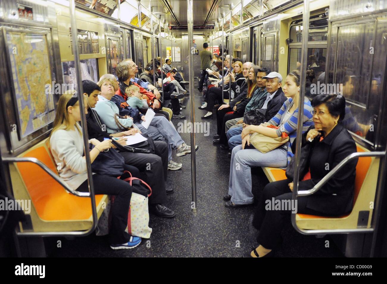Apr 11, 2010 - Manhattan, New York, USA - Commuters on a downtown 1 ...