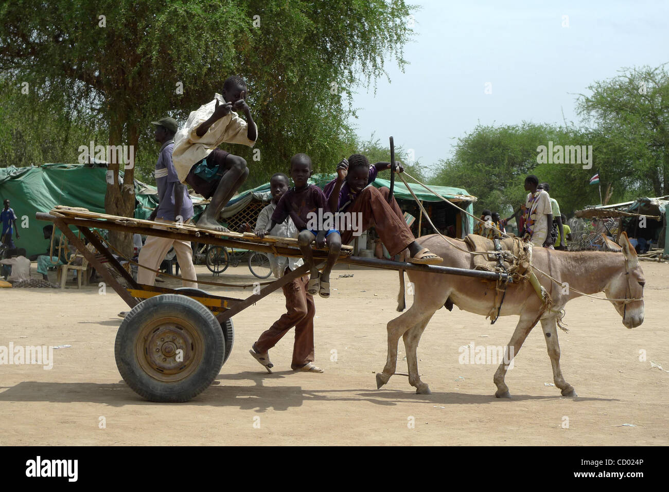 Mar 13, 2010 - Turalei, Sudan - Sudanese kids ride through Turalei on a ...