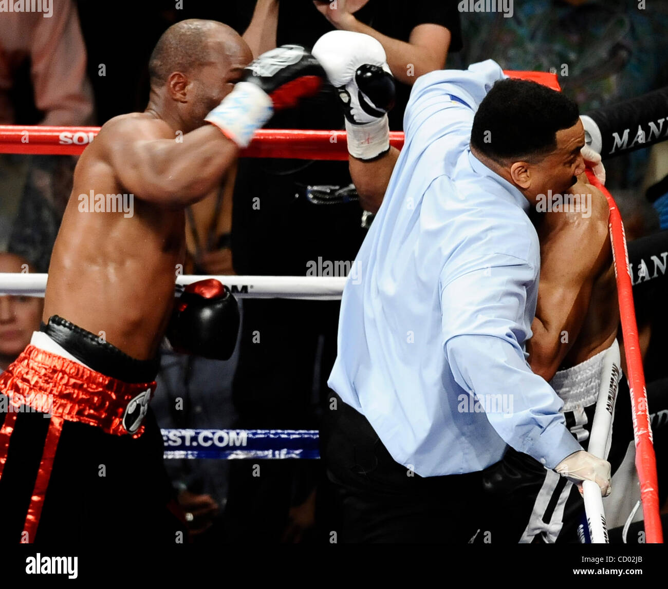 April 3,2010- Las Vegas NV., USA.(C) Referee Tony Weeks tries to stop ...