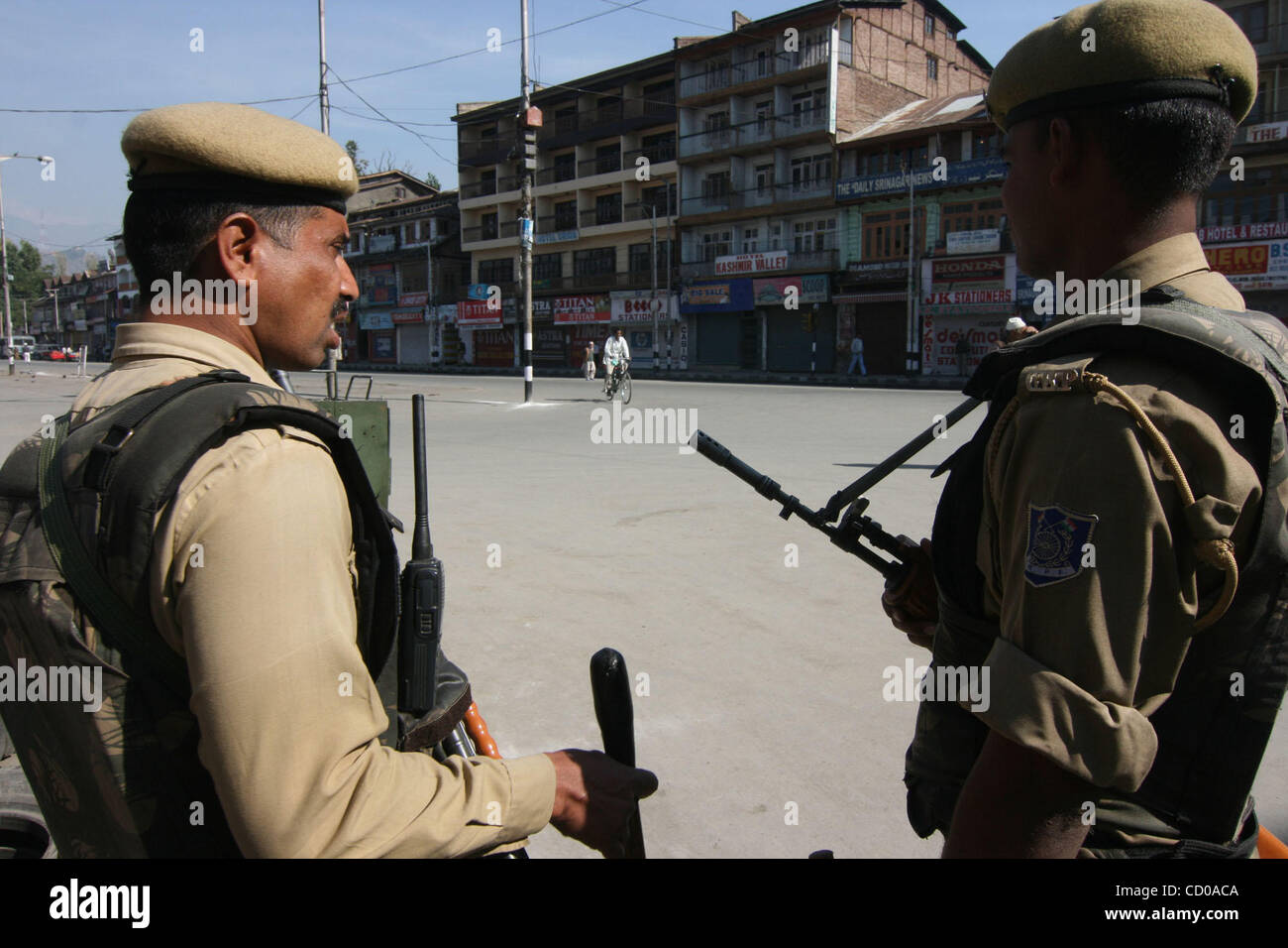Indian paramilitary soldiers stand guard during a strike against Indian ...