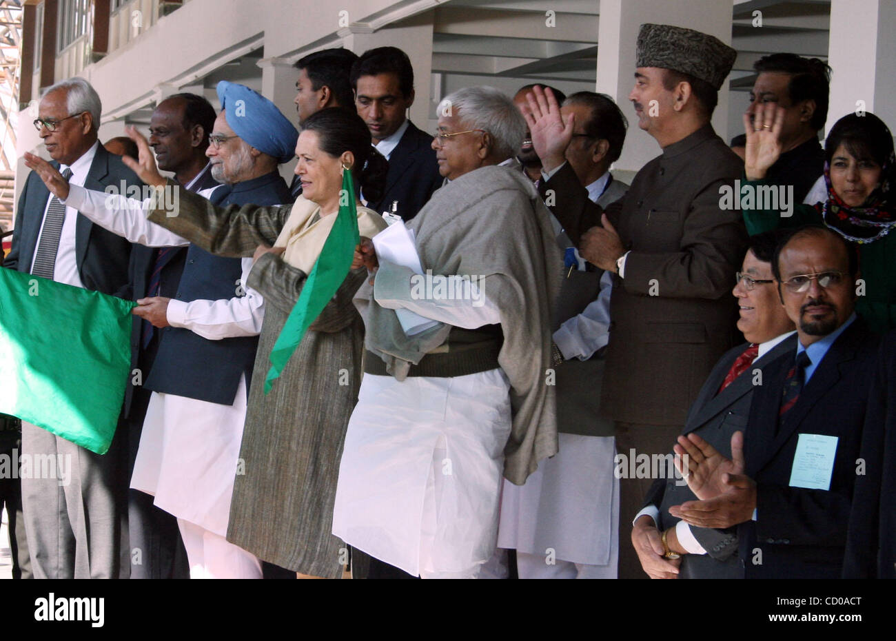 Indian Prime Minister Manmohan Singh (wearing turban), Sonia Gandhi (C ...