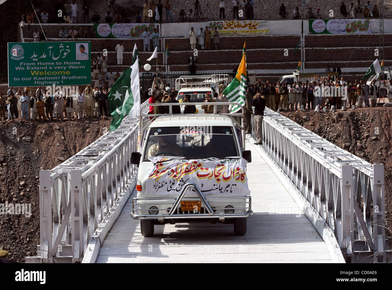 The first vehicle crosses the bridge which connects Indian ...