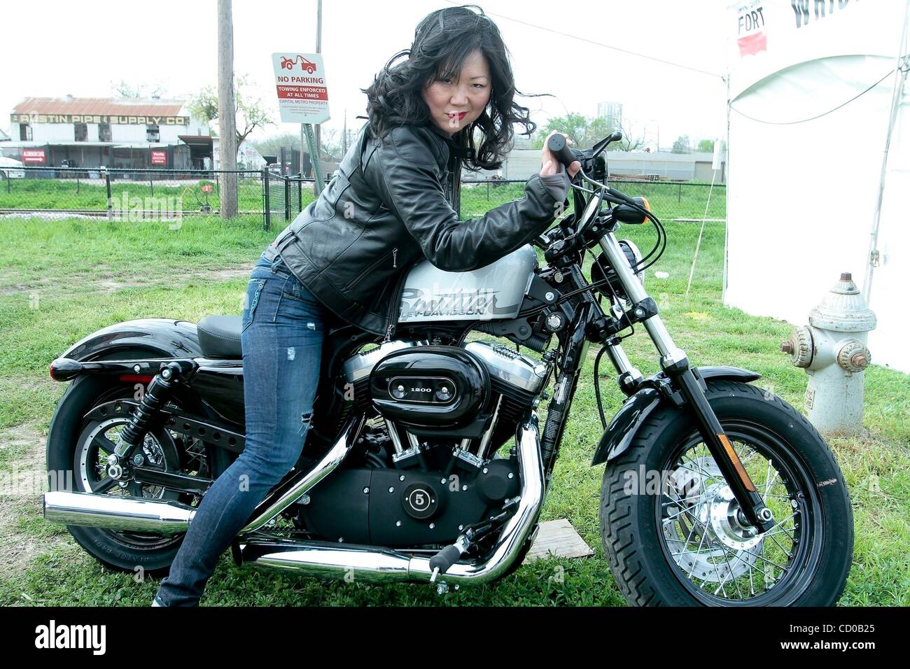 Mar 18, 2010 - Austin, Texas, USA - MARGARET CHO on a Harley during the ...