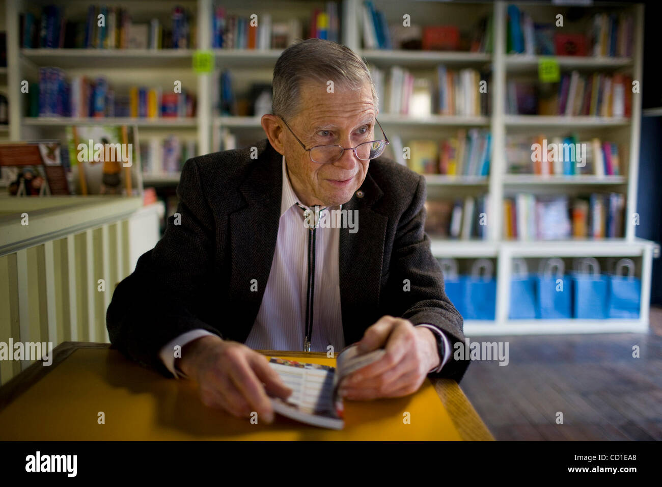 Peter Faye (cq), of Knights Landing, browses through a book on learning ...