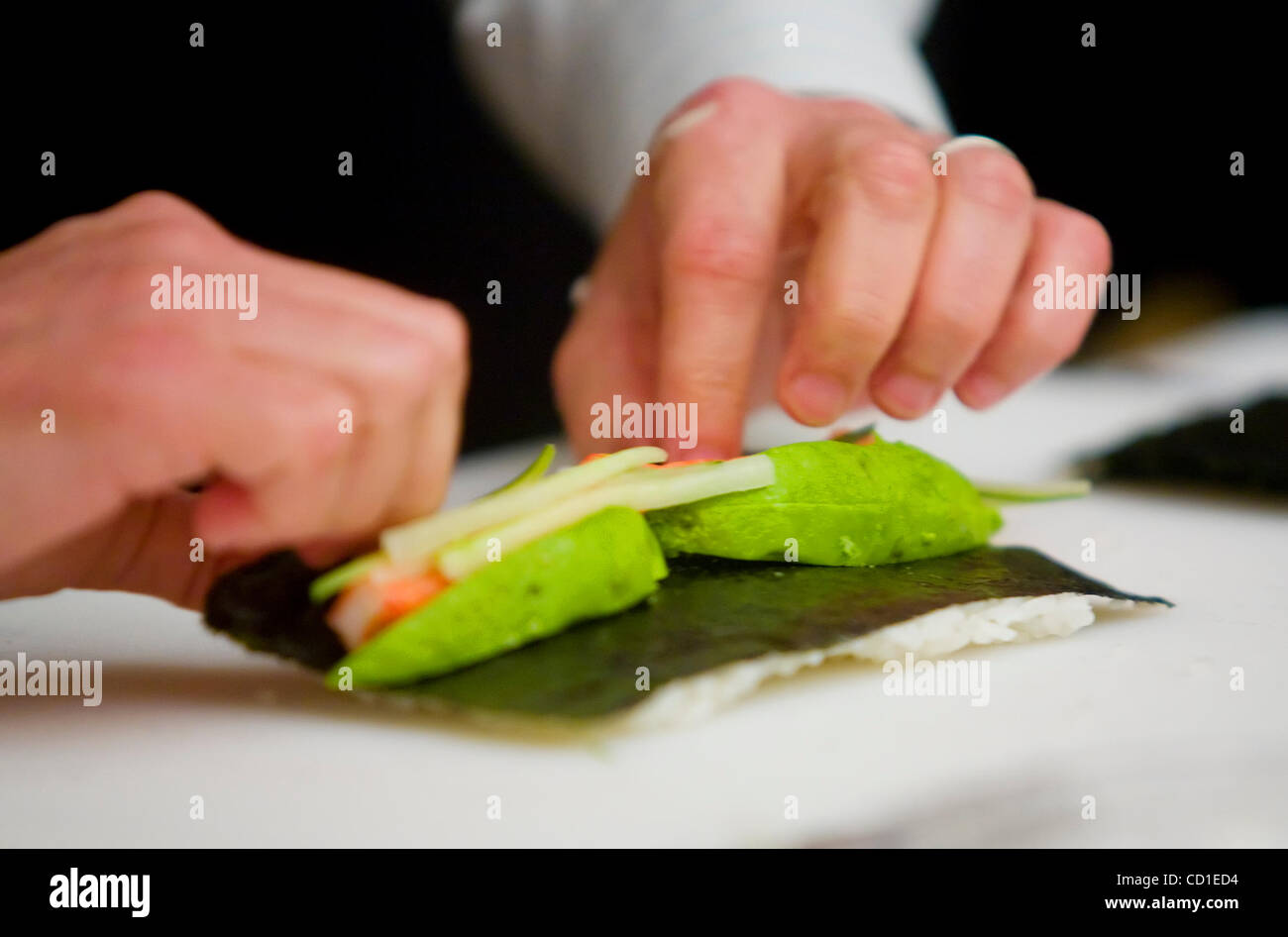 Speaker Fabian Nœ–ez, D-Los Angeles, rolls a California roll, during ...