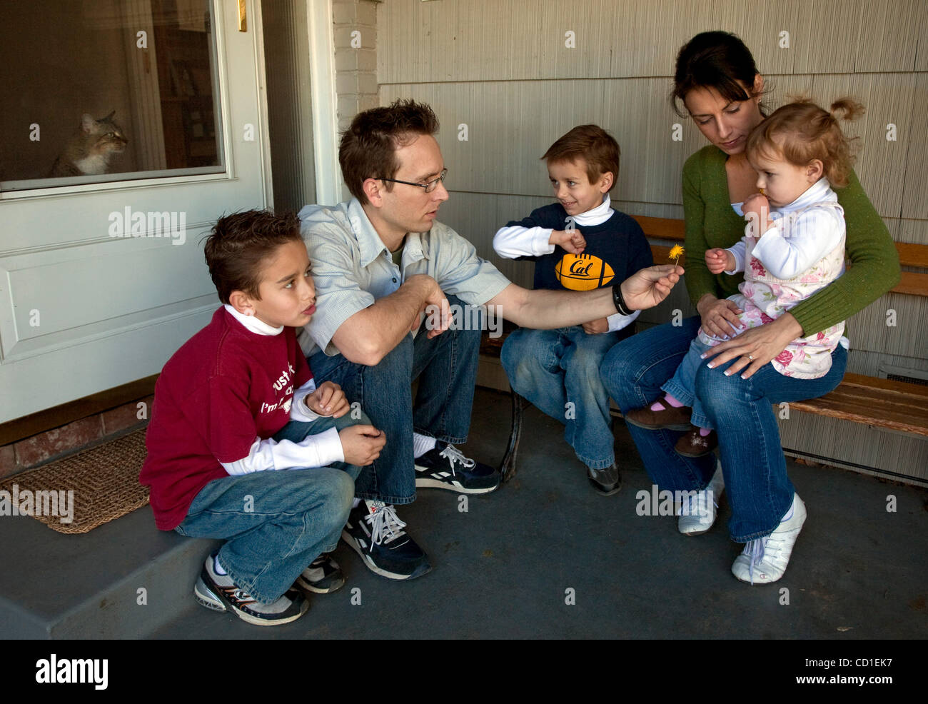 Margo and Michael Powers with their three children, Noah, 8, Luke, 4 ...