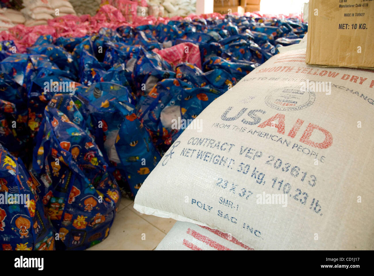 September 27, 2008, Gonaives, Haiti - Bags of wheat and rice provided ...