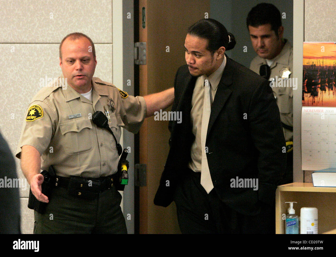 November 10, 2008, Vista, CA, USA PENIFOTO TAEOTUI is led into the ...