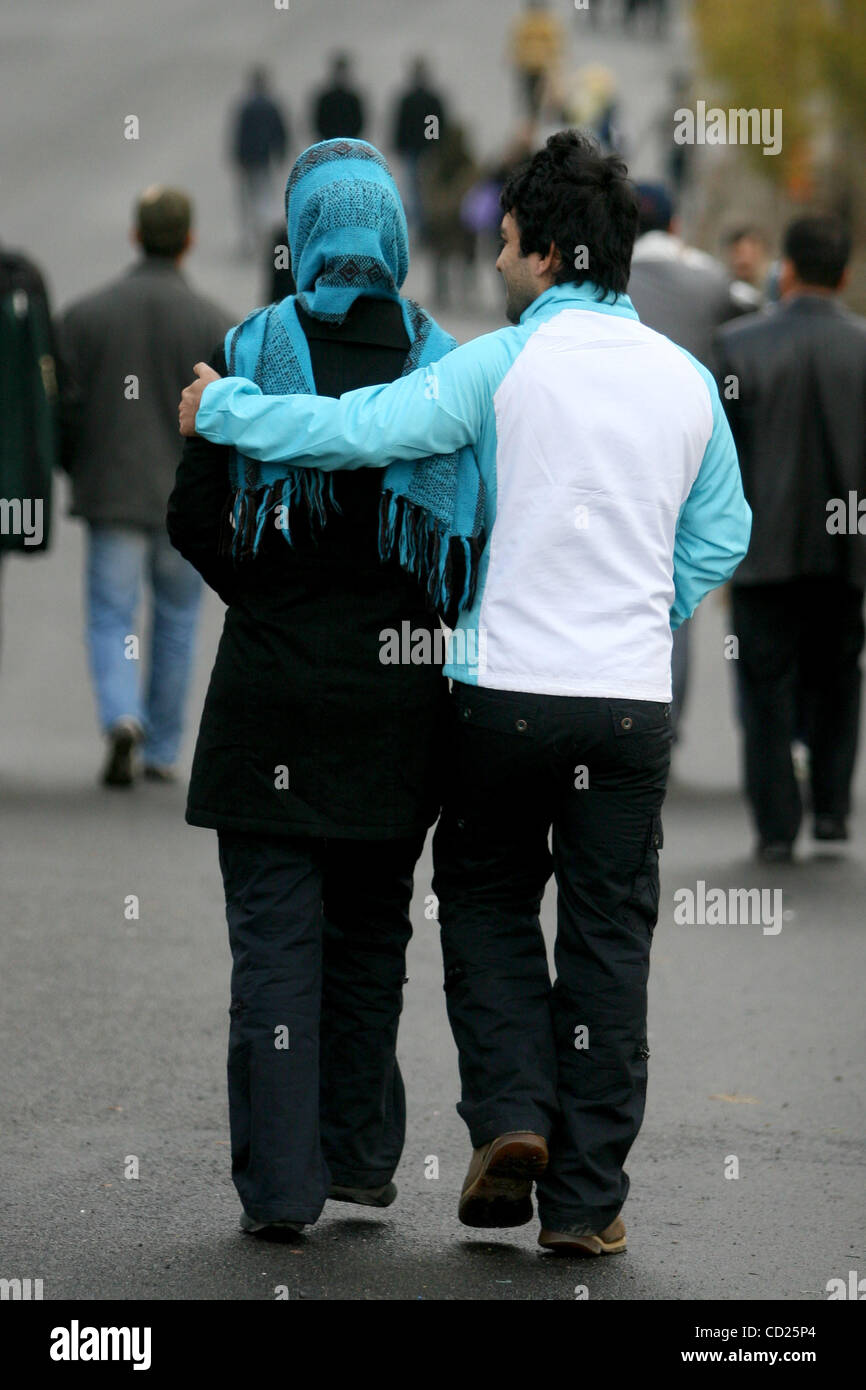 2008/11/21: An Iranian couple walking in Touchal mountains in north of ...