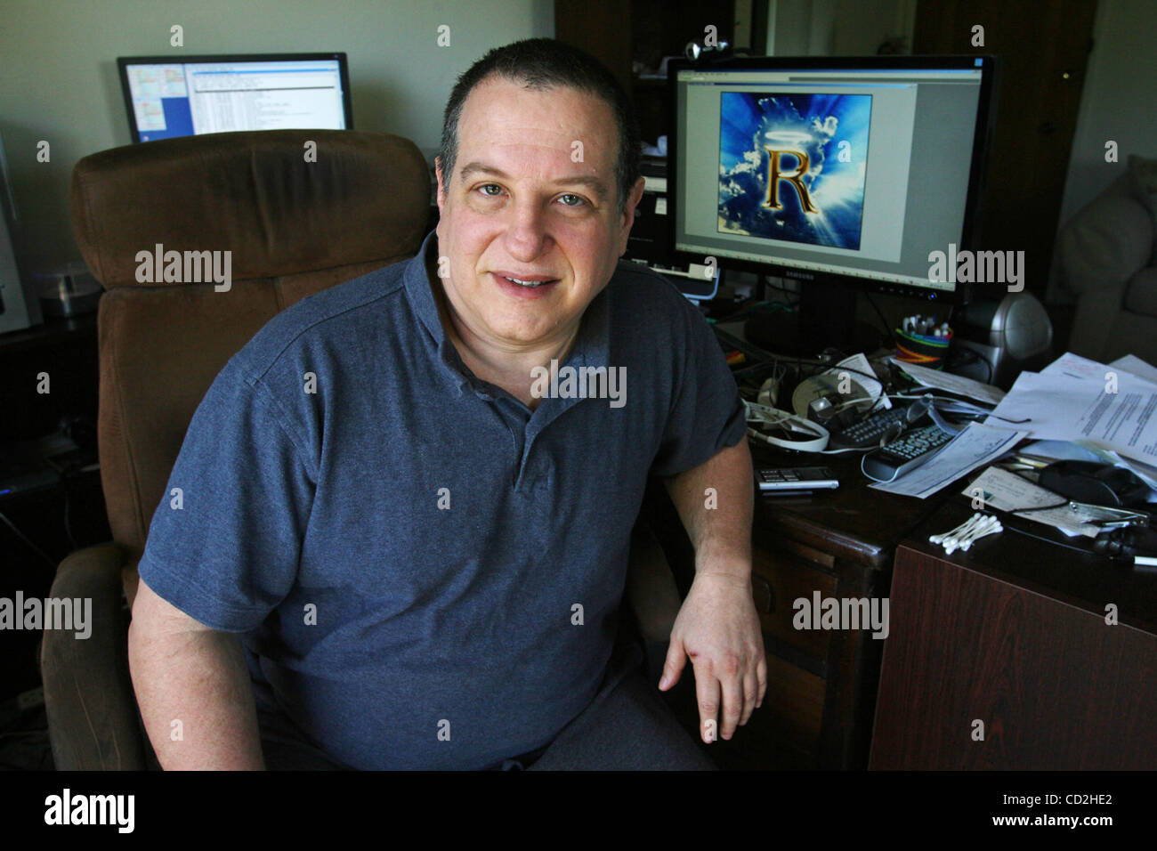 Marc Perkel, sits in his apartment, in his San Bruno,Calif., Tuesday ...