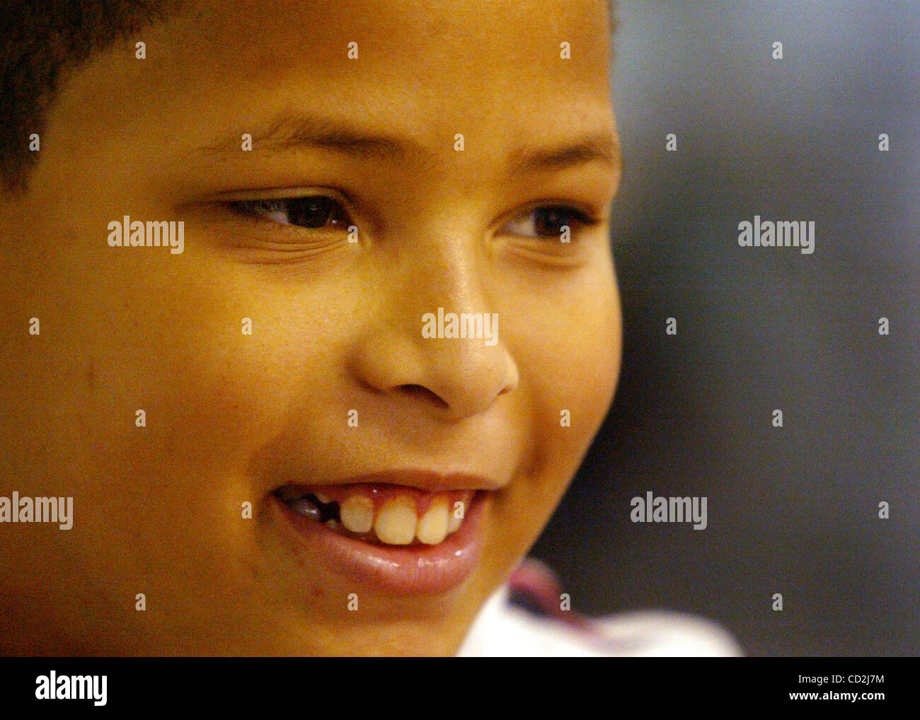 Christopher Rodriquez ,10, smiles while playing pool with friends in ...