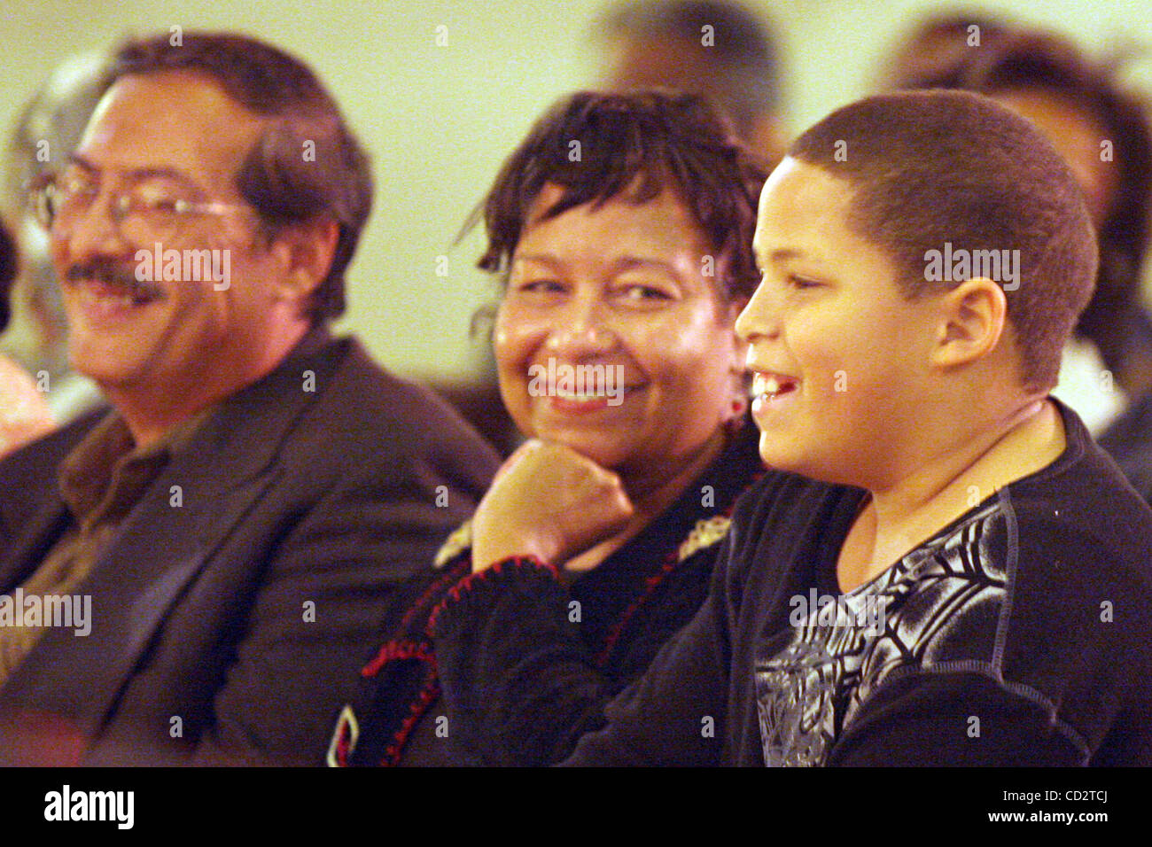 Christopher Rodriguez, 10, right, along with his parents Richard and ...