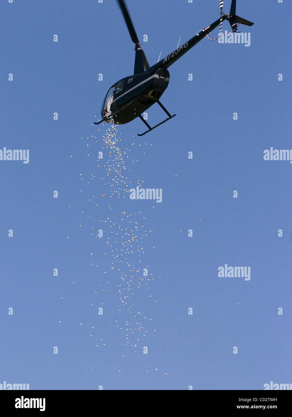 5,000 plastic Easter eggs are dropped from a helicopter during the ...