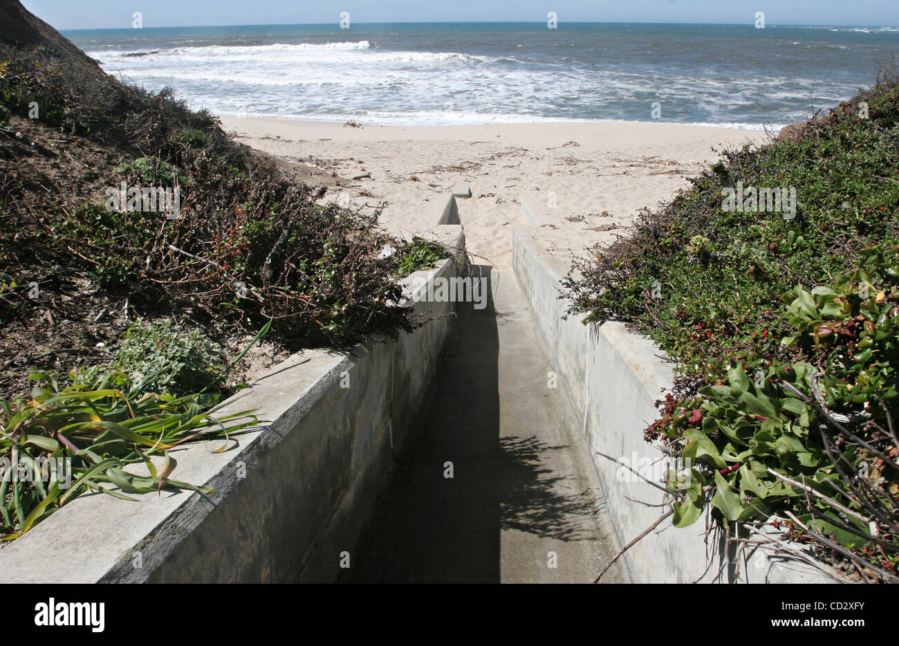 The Pillar Point Air Force Station's storm drain runs onto the beach at ...