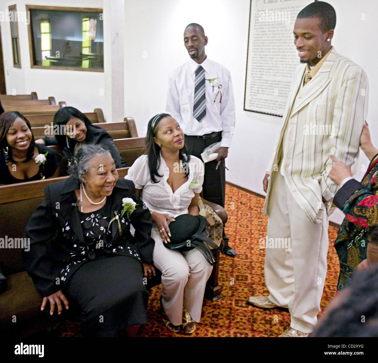 Carrie Taylor, 85, left, meets Terry Sanders, 21, right, the man who ...