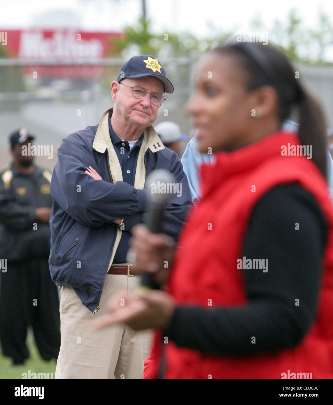 Oakland Police Chief Wayne Tucker listens to city councilmember Desley ...