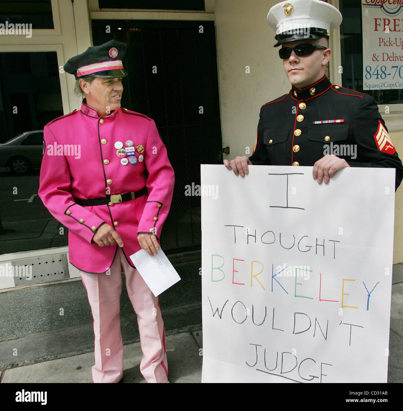 Tighe Barry, left, a "Pink Marine" with Code Pink, confronts a real ...