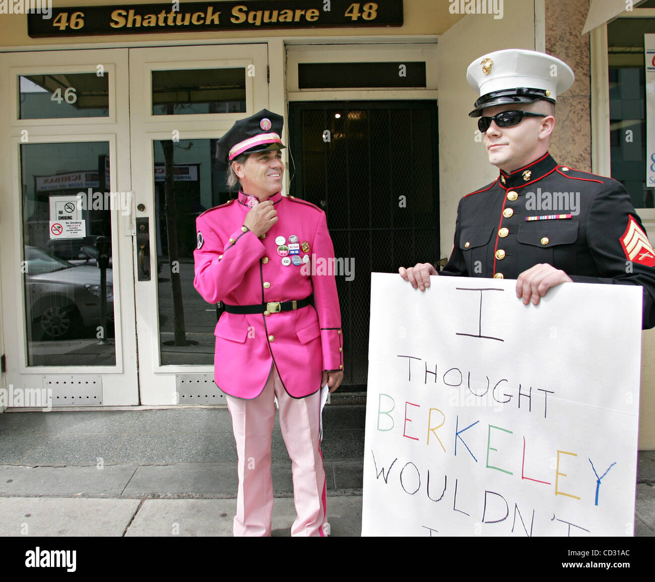 Tighe Barry, left, a "Pink Marine" with Code Pink, confronts a real ...