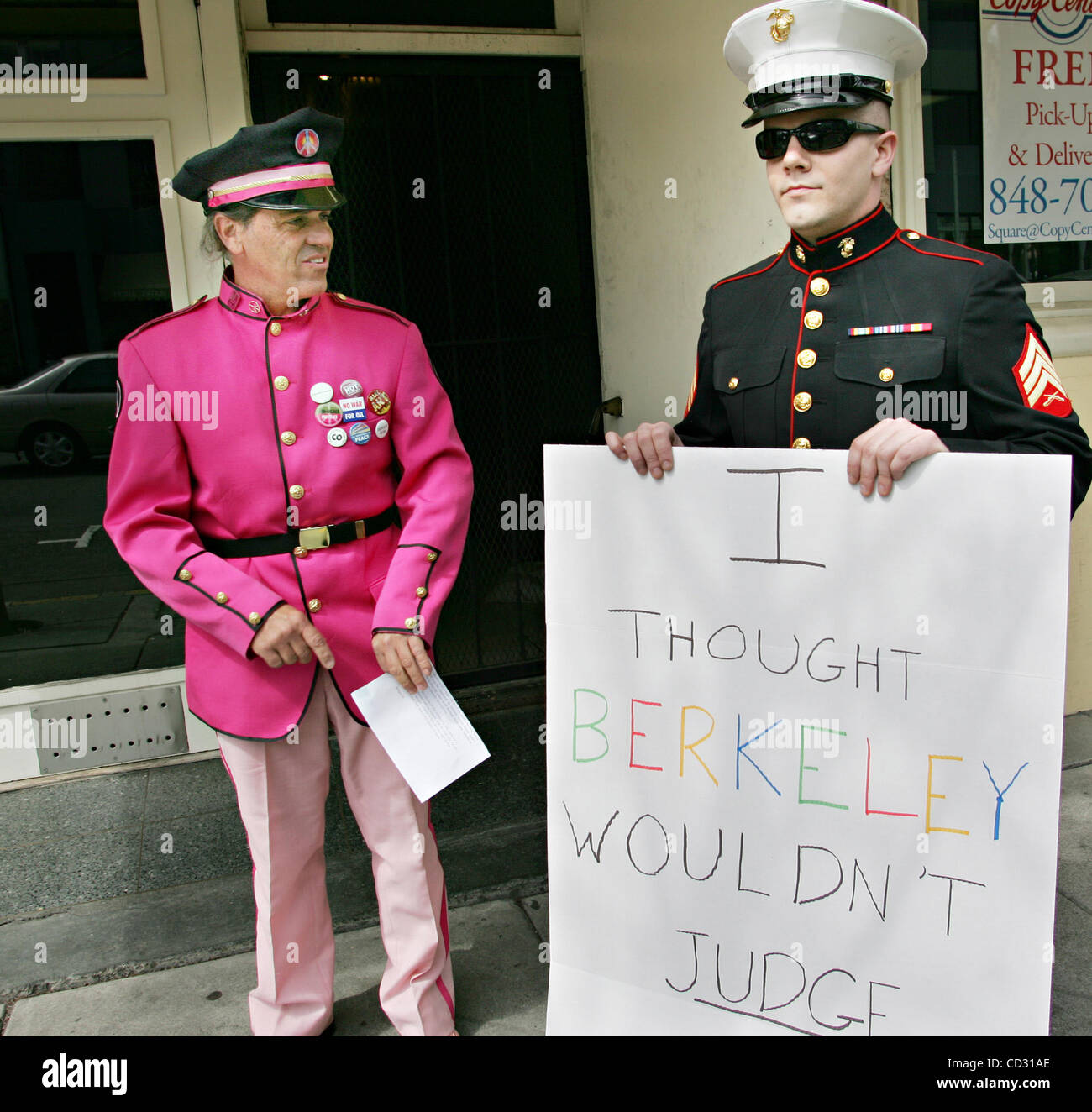Tighe Barry, left, a "Pink Marine" with Code Pink, confronts a real ...