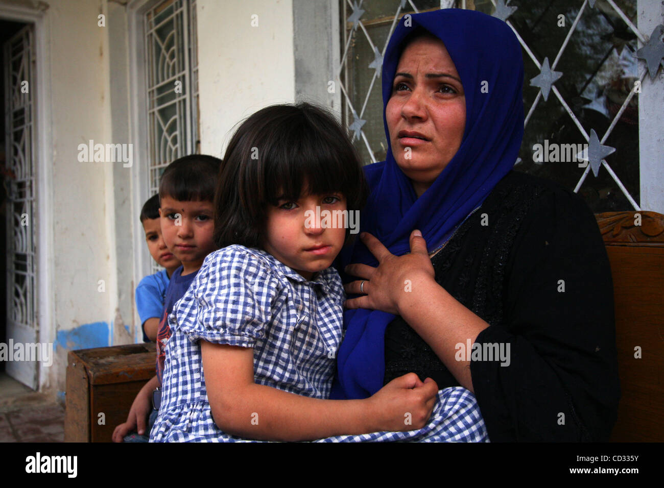 Apr 06, 2008 - Khalis, Diyala Province, Iraq - An Iraqi mother receives ...
