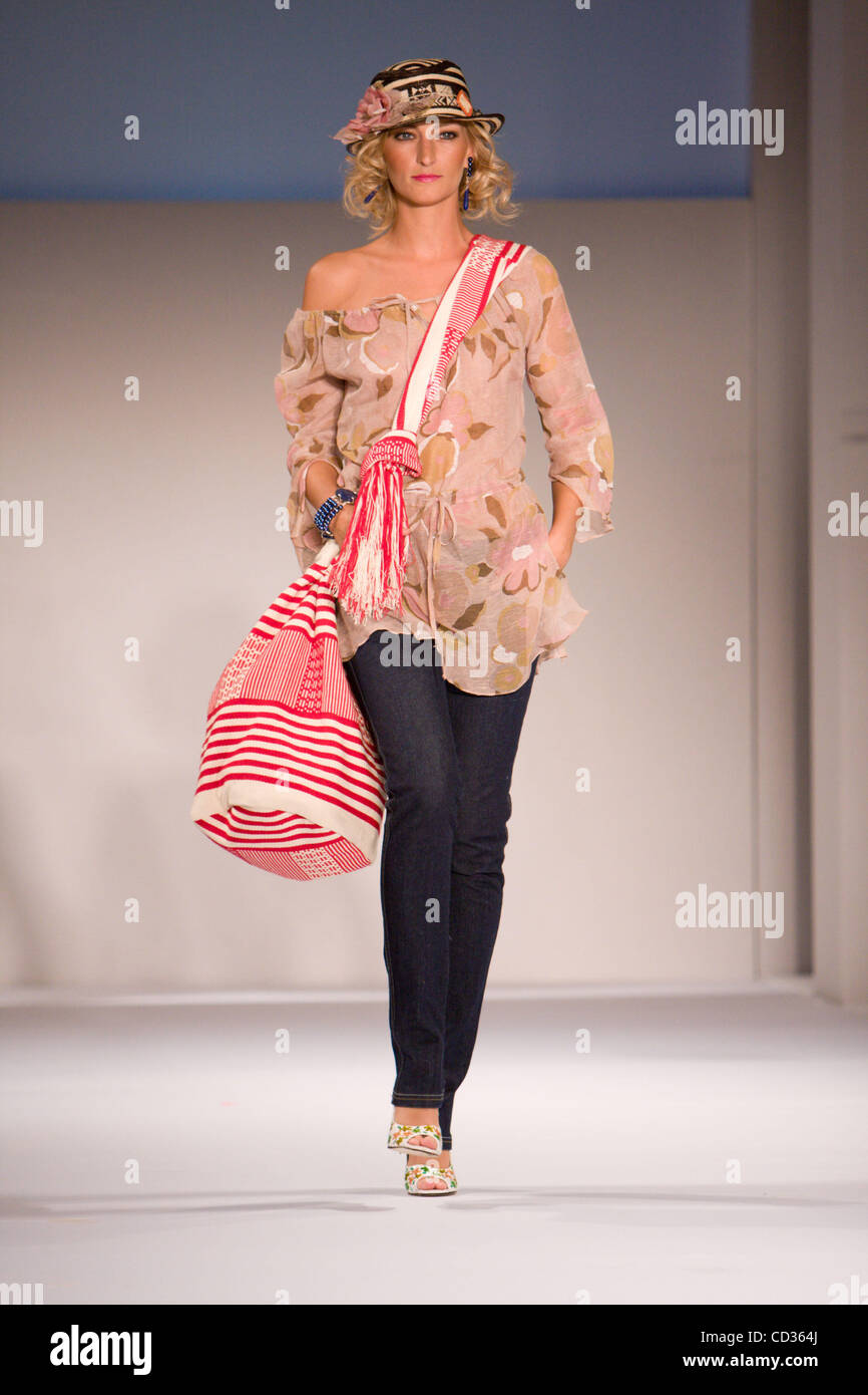 models walking the runway wearing clothing designed by Hernan Zajar at ...