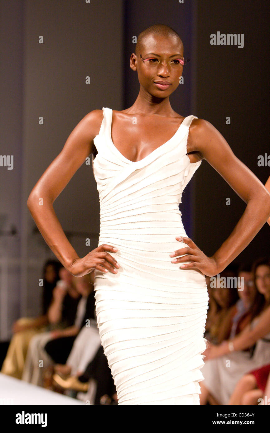 models walking the runway wearing clothing designed by Ruben Campos at ...
