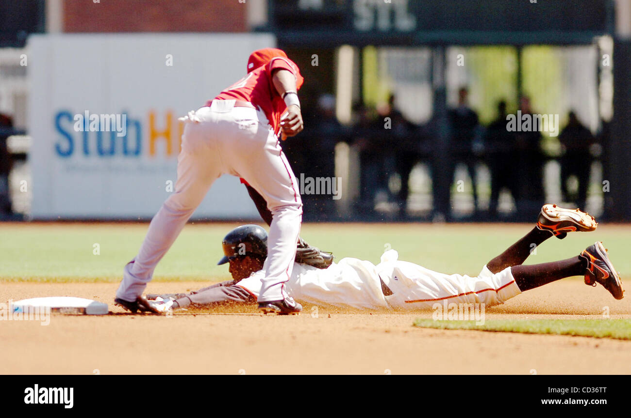 Giants baserunner Eugenio Velez comes up a bit short on a steal attempt ...