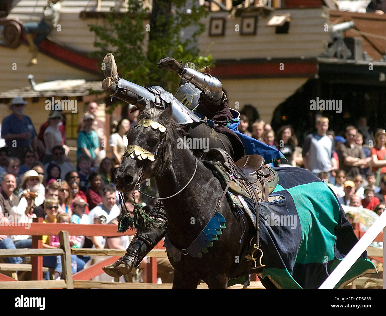 James Fortner II is unseated from his horse during the royal joust at ...