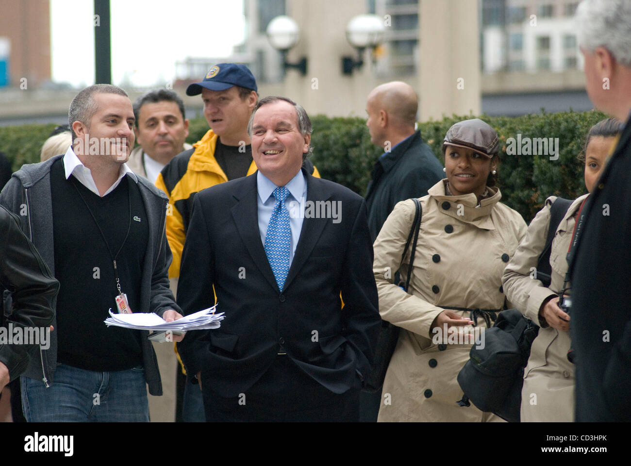 Mayor Richard M. Daley is escorted while walking over to the set of the ...