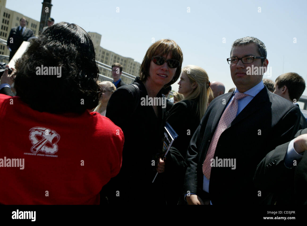 DOT Commissioner Janette Sdik-Khan (c. in glasses) at the presser. Mayor Michael Bloomberg and ...