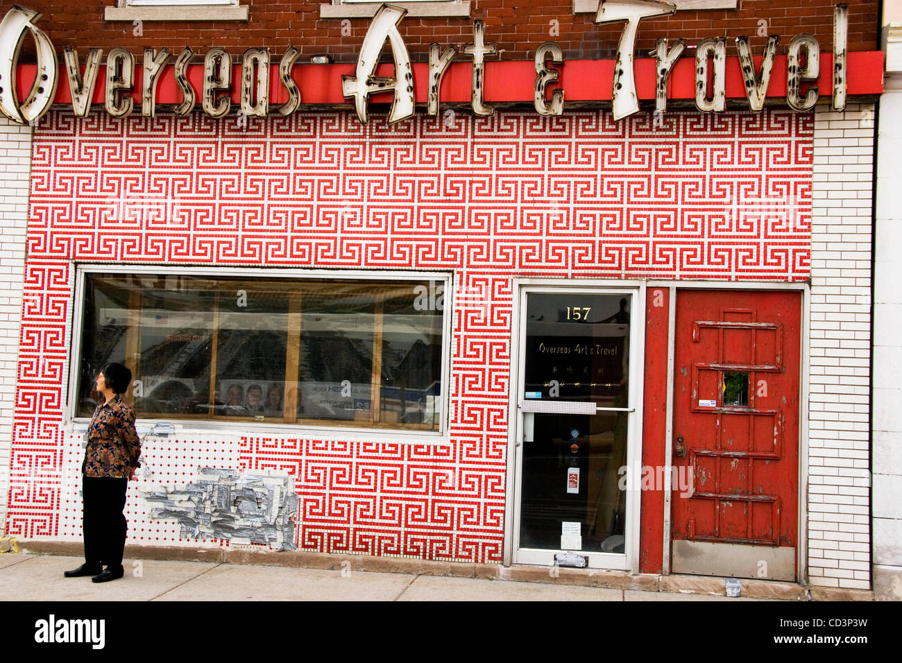 THIS IS CHINATOWN IN CHICAGO. THIS IS AN OLD RUN DOWN BUILDING ON THE ...