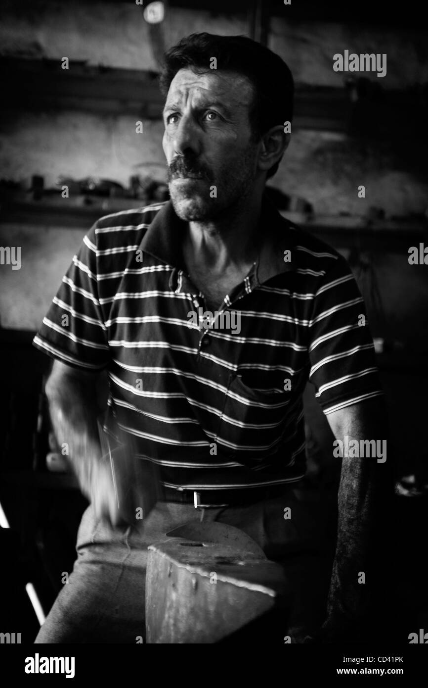 July, 12, 2008 - Diyarbair, Turkey - Blacksmith Piran Baran works on ...