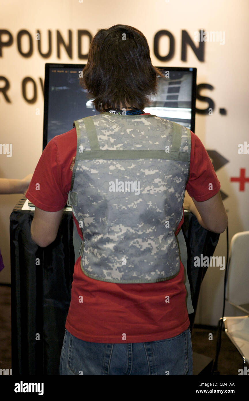 Gamer experiencing the "TN Gamers Gaming Vest" jacket which lets the ...