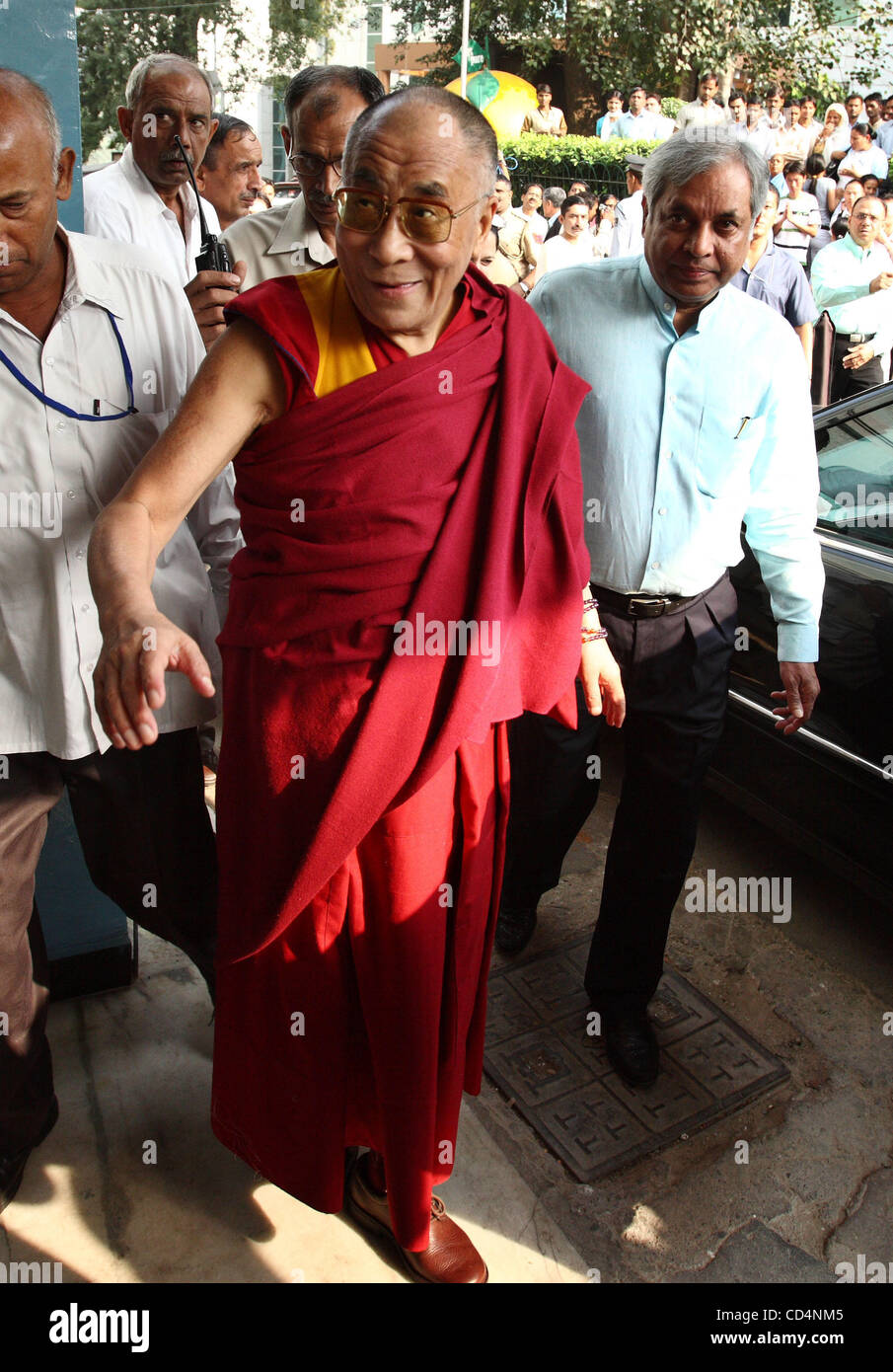 Tibetan spiritual leader the Dalai Lama gesture as he leaves the Ganga ...