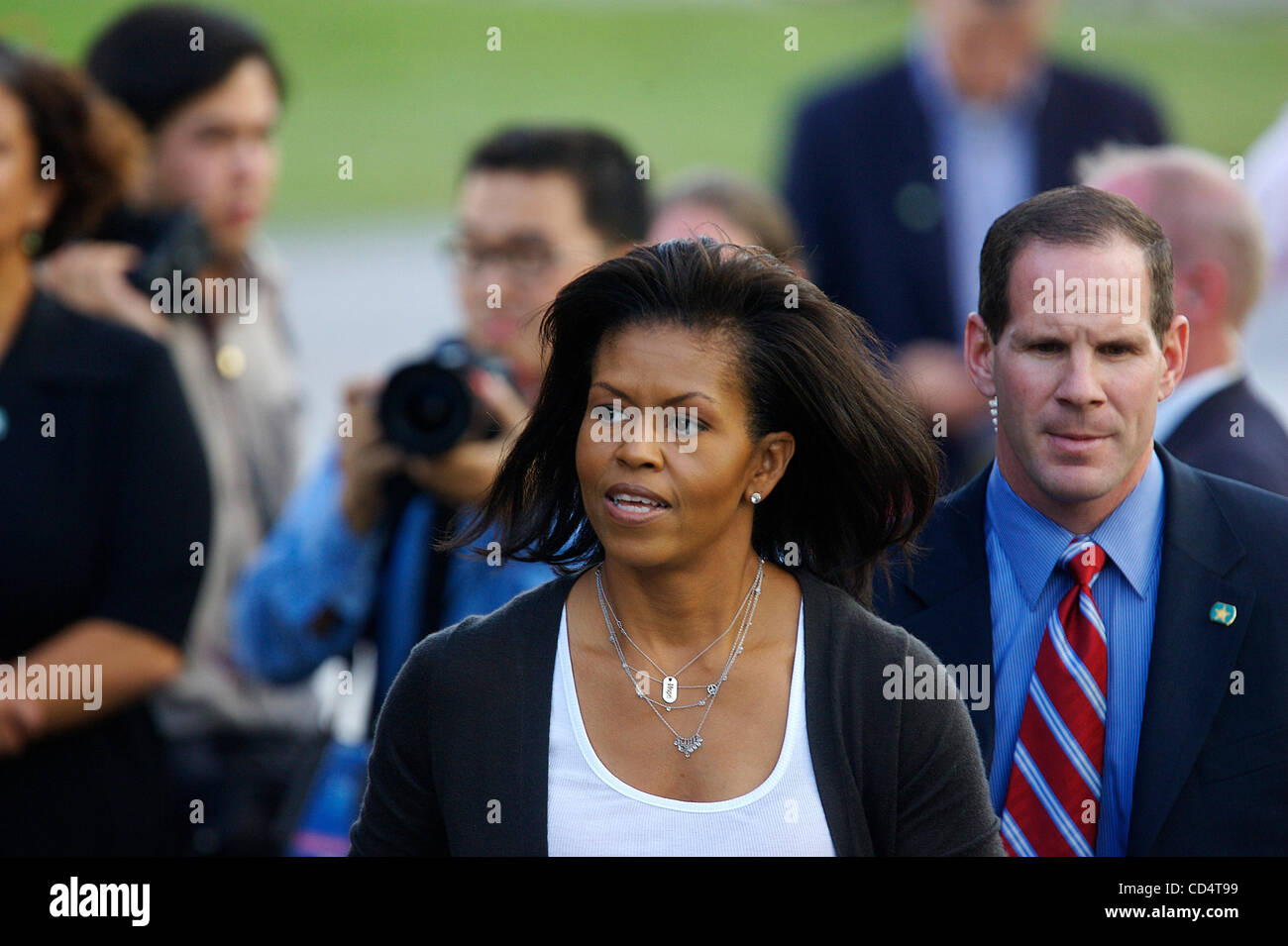 Michelle Obama gets ready to take the stage and speak during a early ...