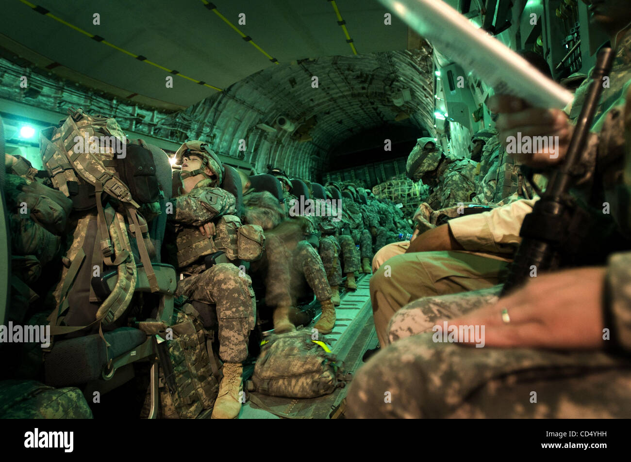 Oct 26, 2008 - Baghdad, Iraq - U.S. soldiers rest in a C-130 during ...