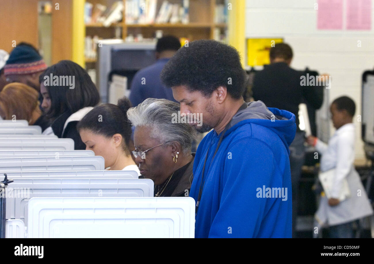 LITHONIA, GA - OCTOBER 28: People cast their ballots during early ...