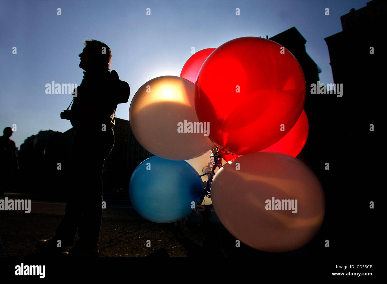 Supporters with Red, White and Blue Ballons wait in line at Grant Park ...