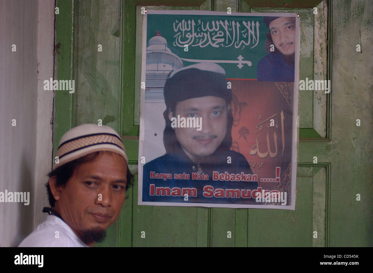 Chairul Anwar, a brother of Bali bomber Imam Samudra, stands near the ...