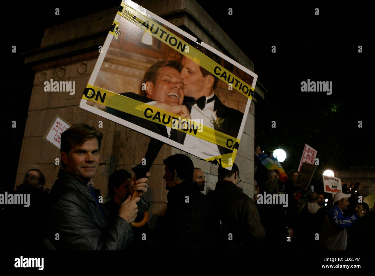 New Yorker Anthony Brown carrying a sign with a picture of himself ...