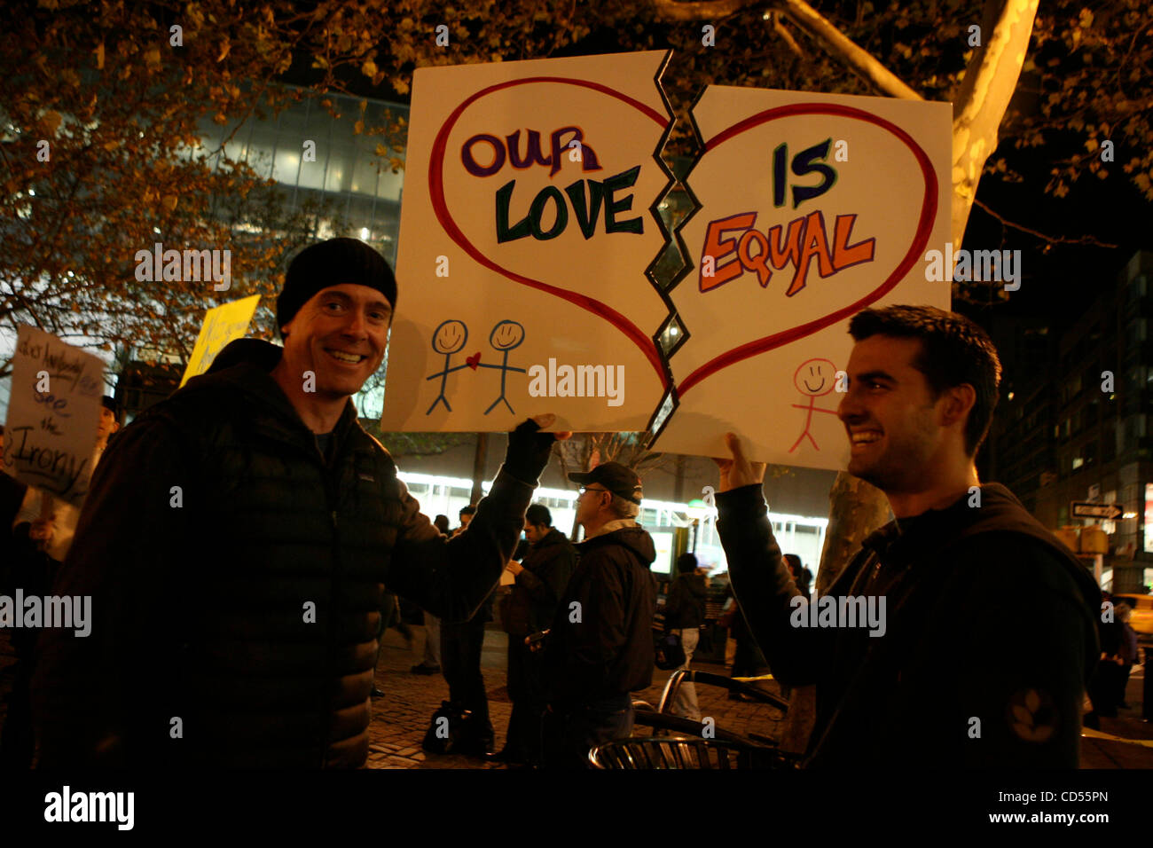 L/R: Mike Kitson and his partner William Lange of Manhattan carrying a ...