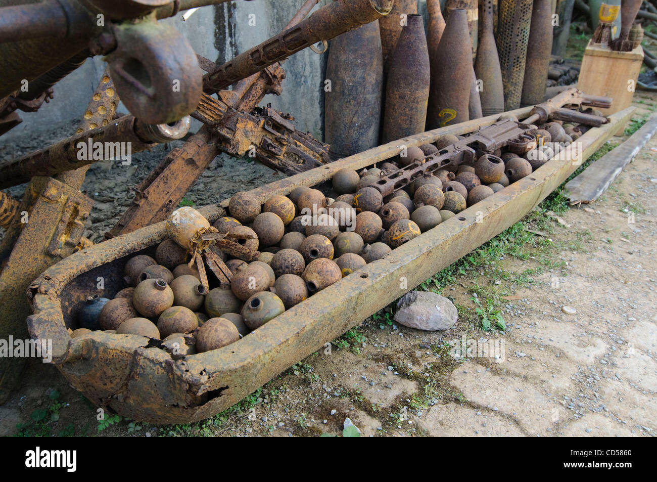 Cluster bomblets on display at teh tourist office in Ponsavanh, laos ...