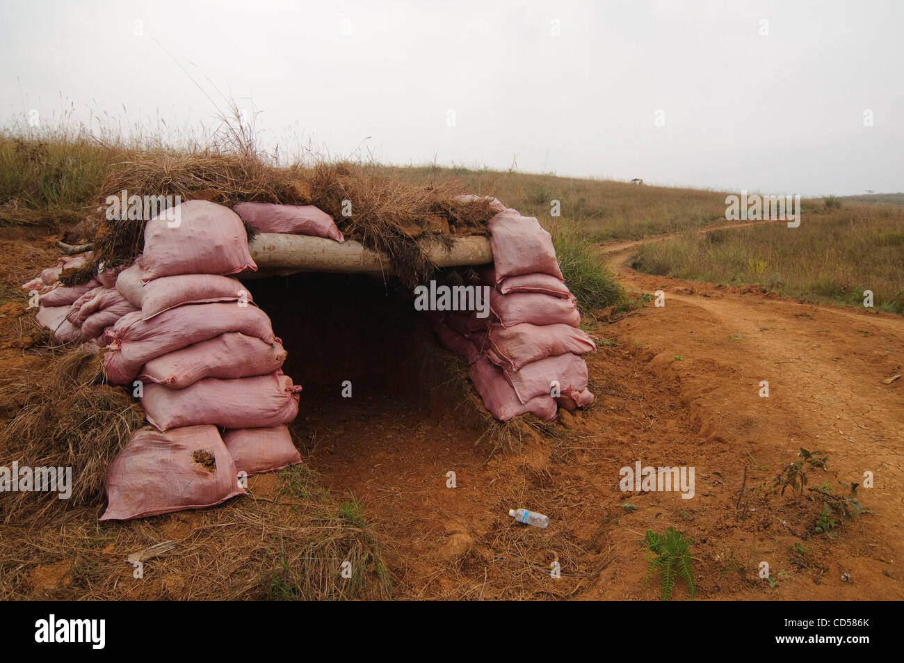 UXO Laos bomb disposal personnel prepare to detonate unexploded ...