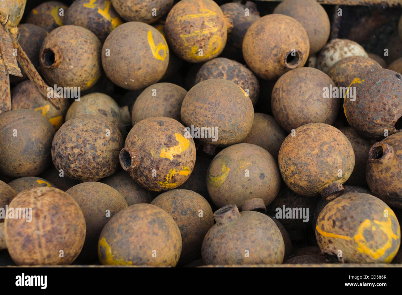 Cluster bomblets on display at teh tourist office in Ponsavanh, laos ...