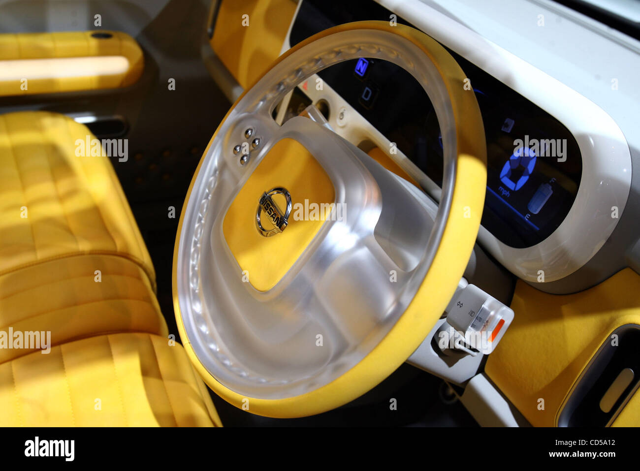 the yellow interior of the nissan denki cube electric concept car is ...