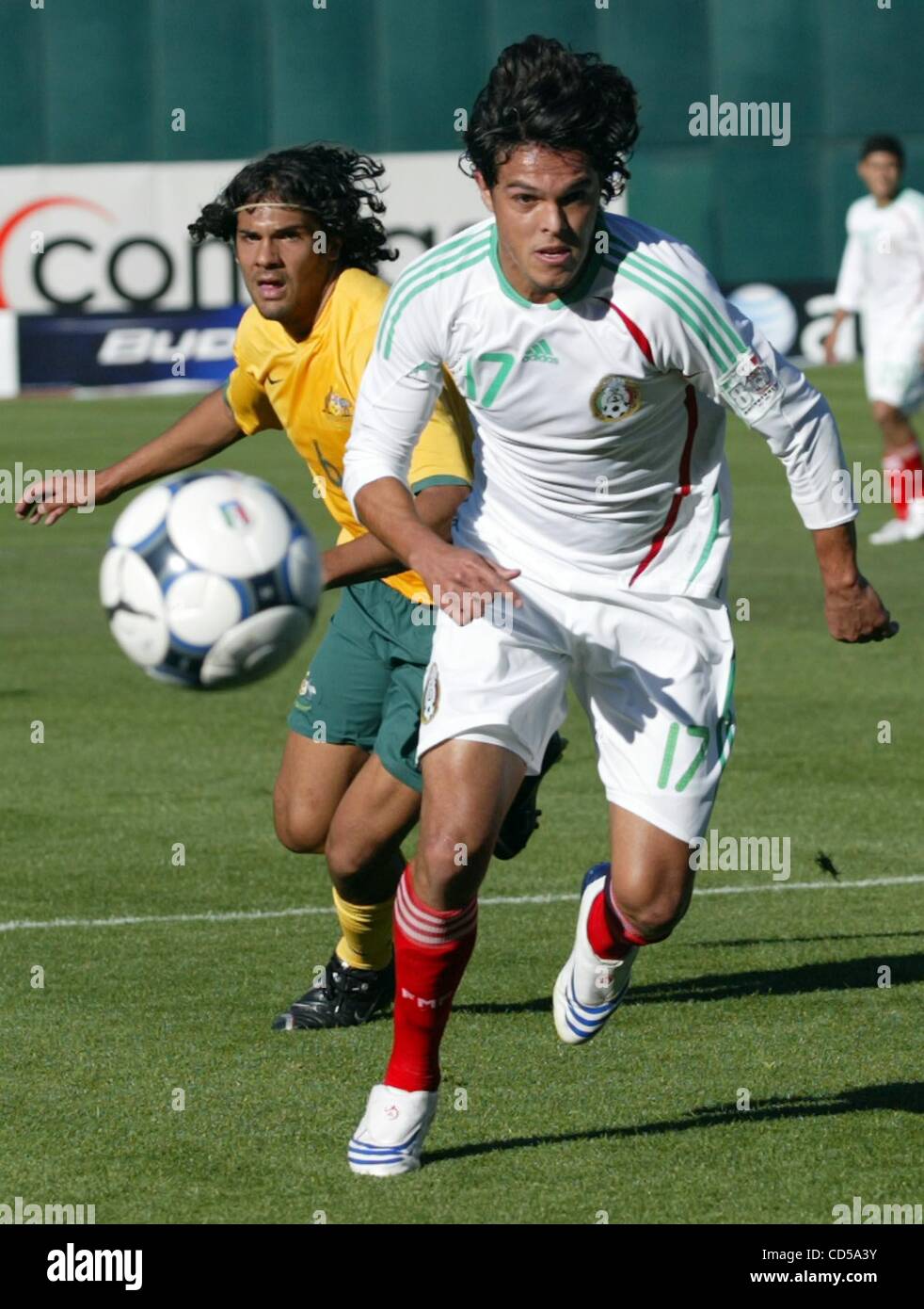 Mexico's Luis Angel Landin (17) chases a pass in front of Nikolai Topor ...