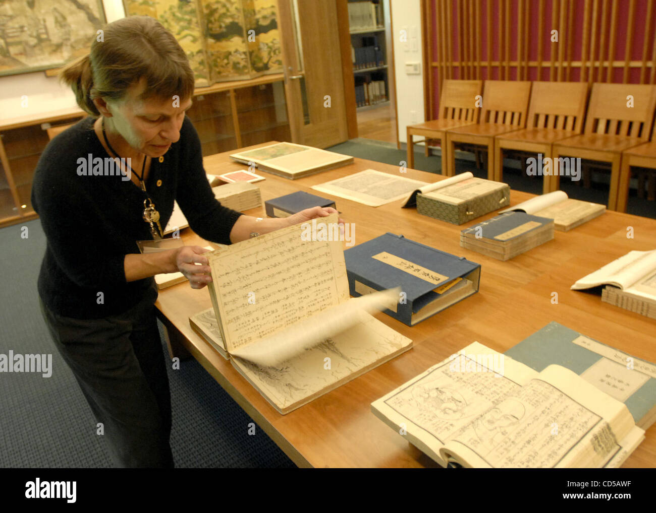 Librarian Deborah Rudolph shows an 1829 Isanatori Ekotoba by Oyamada ...